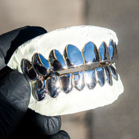 Custom Gold Grillz - Shop at the #1 Gold Teeth Jeweler TODAY!